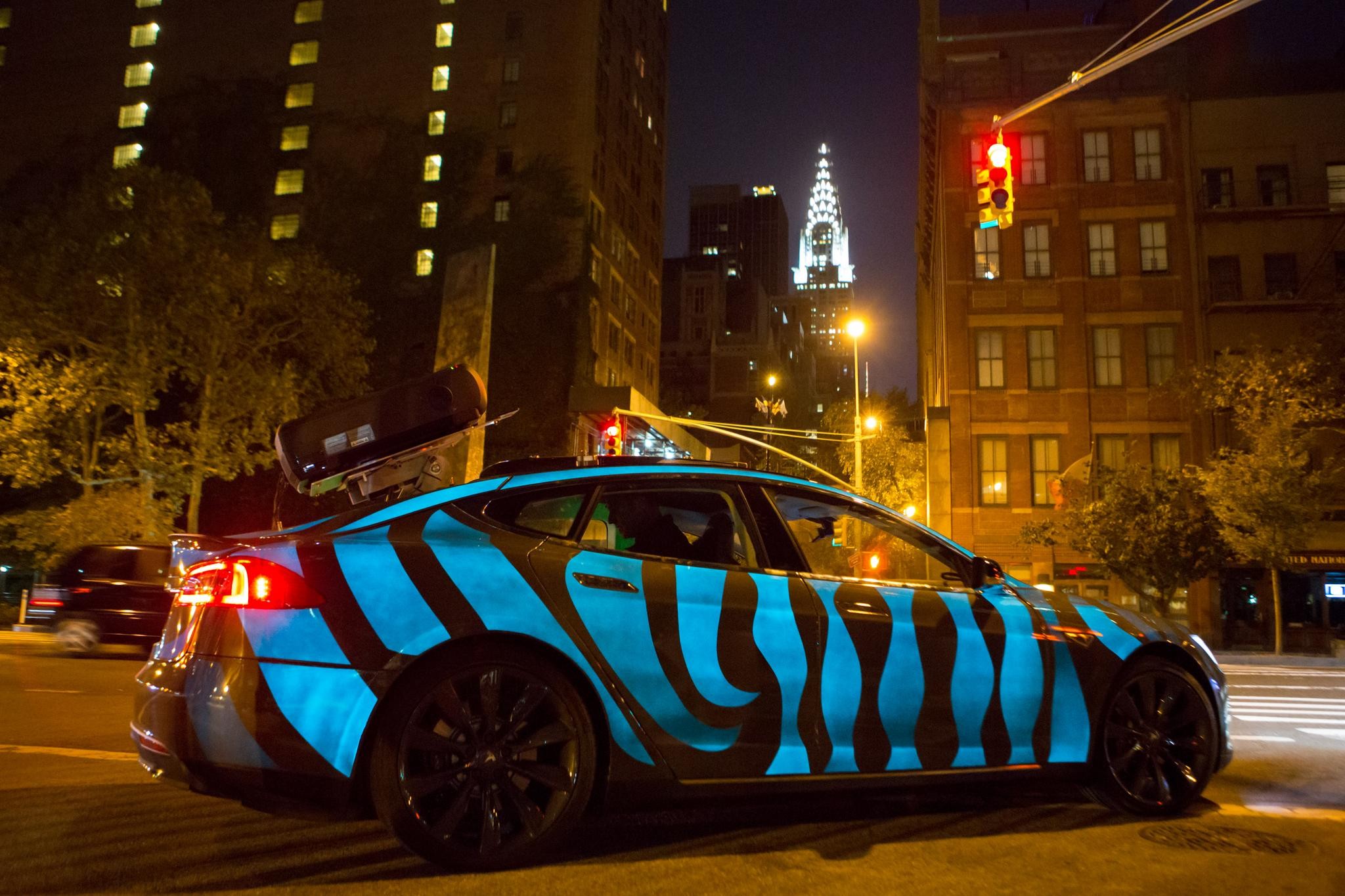 OPS TESLA MOBILE PROJECTION VEHICLE | Campaign | THE WORK